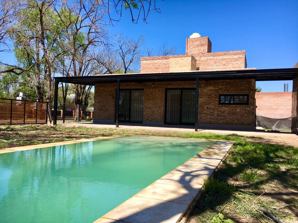 Venta | VENTA/PERMUTA - Casa a estrenar 2 dormitorios y pileta - Funes, Santa Fe. | SHO4047505